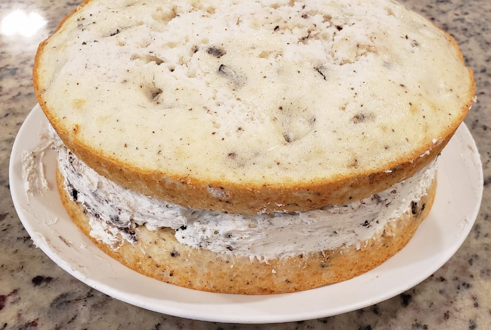 Cheesecake stuffed Oreo Cake - Acadiana's Thrifty Mom